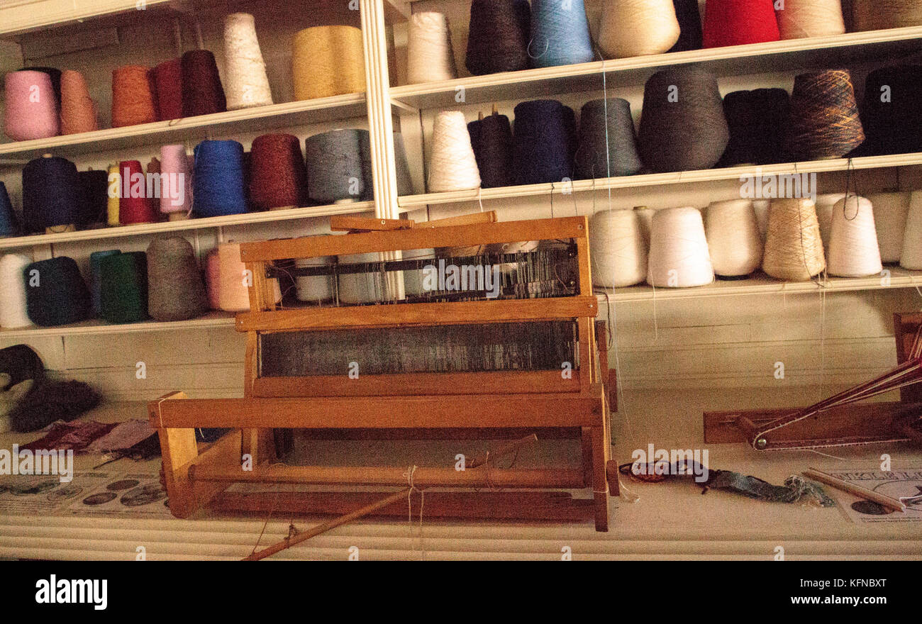 Colorful spools of wool that have been spun from hand and prepared for ...