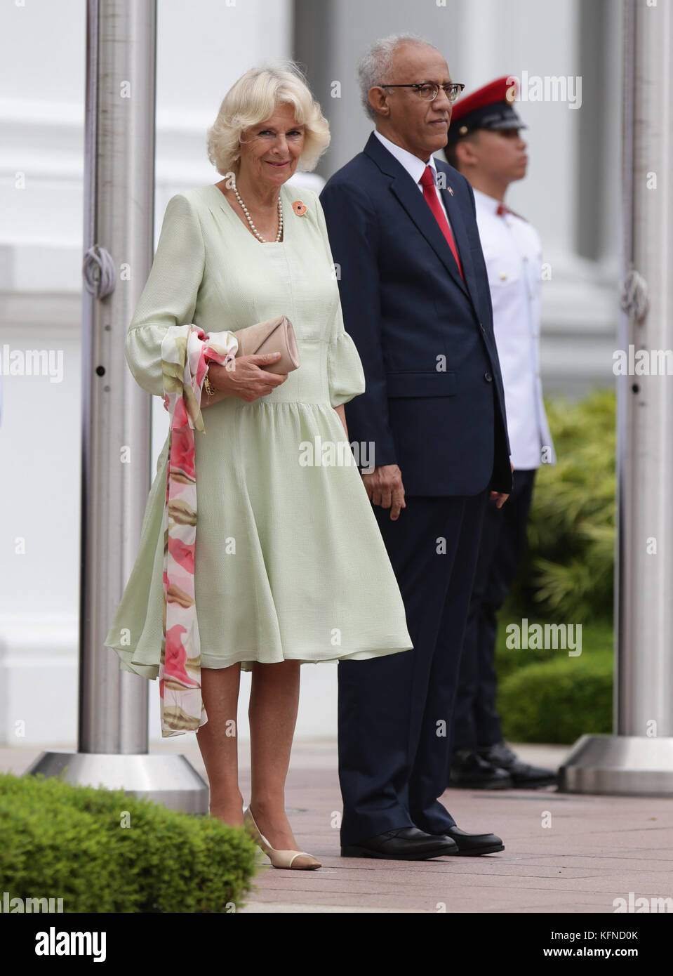 The Duchess of Cornwall, accompanied by Mohamed Abdullah Alhabshee ...