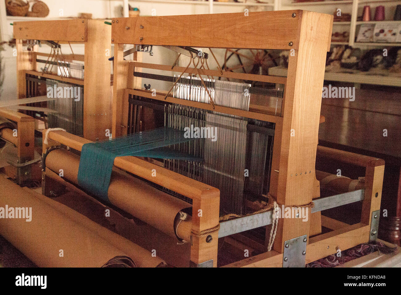 Colorful spools of wool that have been spun from hand and prepared for ...