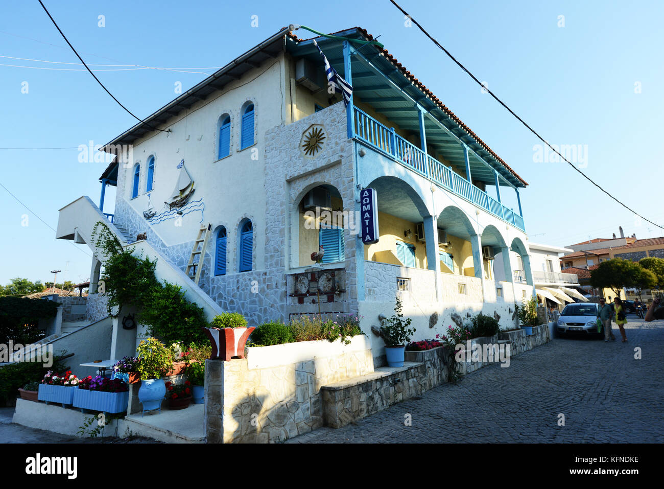A colorful Greek building in the village of Afytos, Chalkidiki, Greece ...