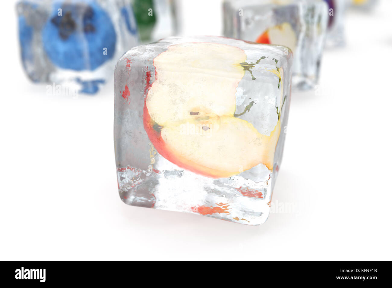 Apple in ice cube isolated on white with depth of field effects. Ice ...