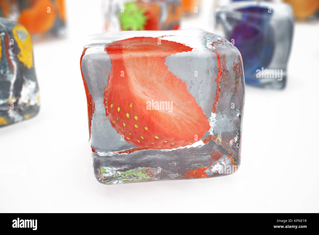 Strawberry in ice cube isolated on white with depth of field effects ...