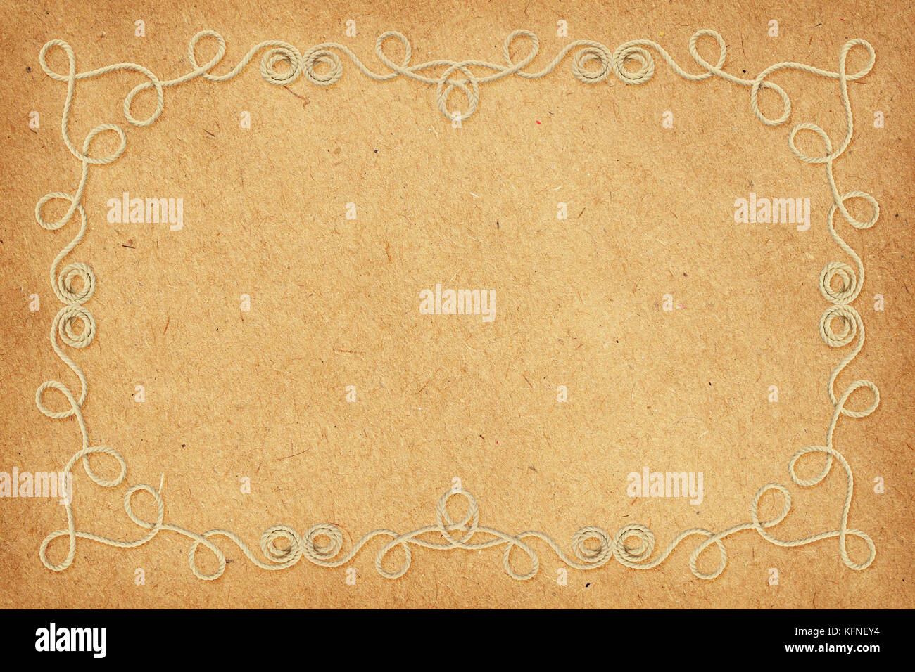 Beige cotton rope frame on craft paper background Stock Photo - Alamy
