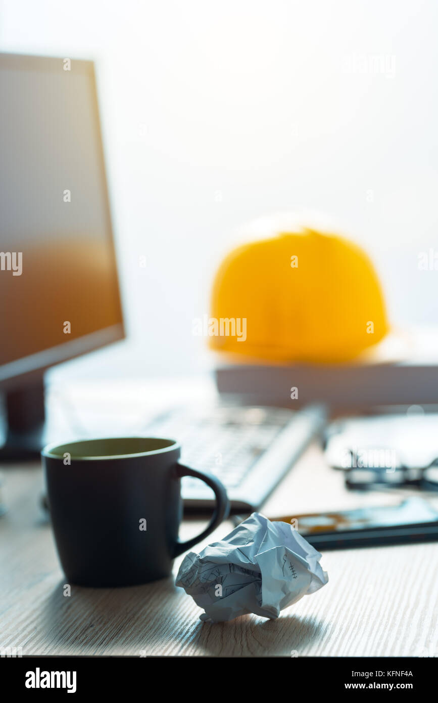 Architecture project failure, crumpled blueprint sketch paper on office ...