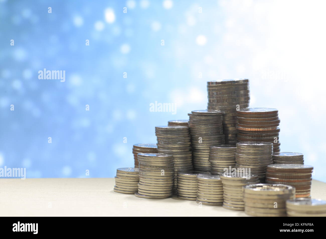 coin stack blue background. Business growth, saving and investment ...