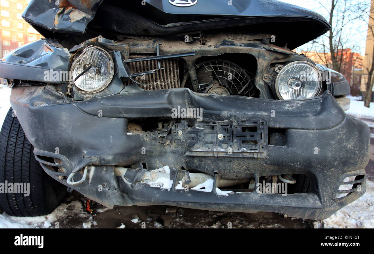 The consequences of a frontal collision of cars Stock Photo - Alamy