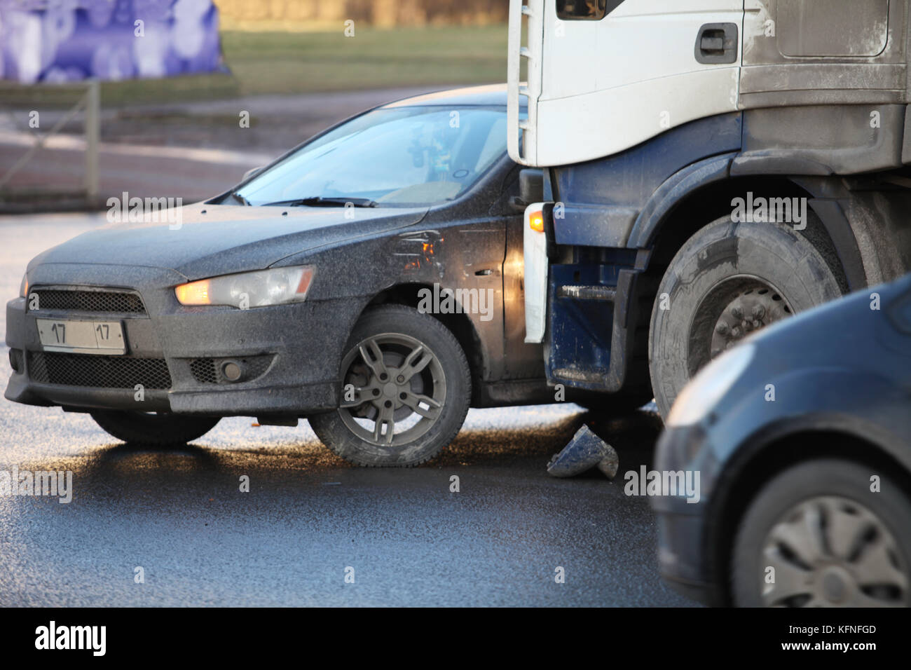 collision of the truck and car on a busy road Stock Photo - Alamy