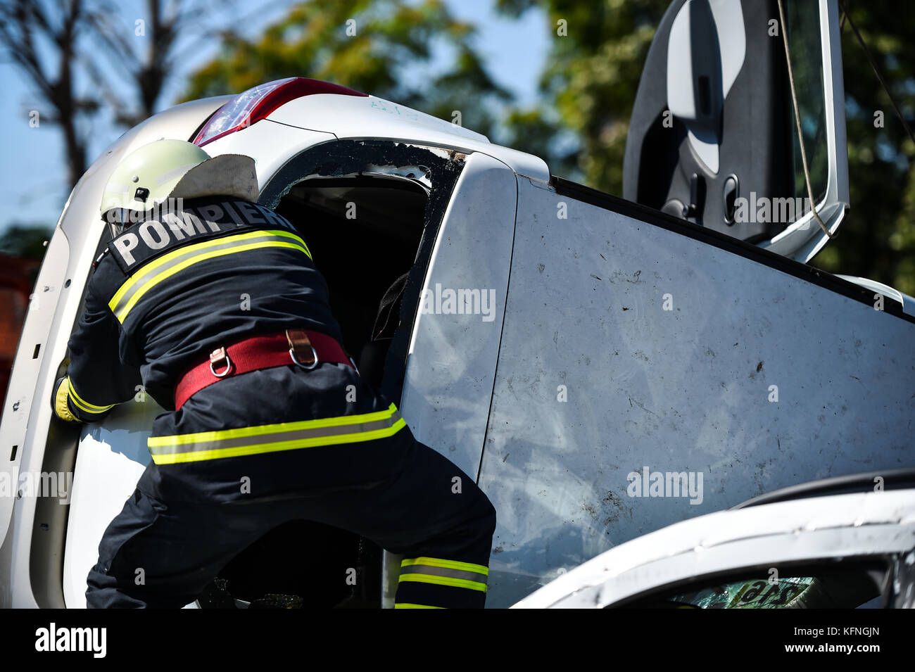 Scene of a car crash and emergency rescue service in action Stock Photo ...