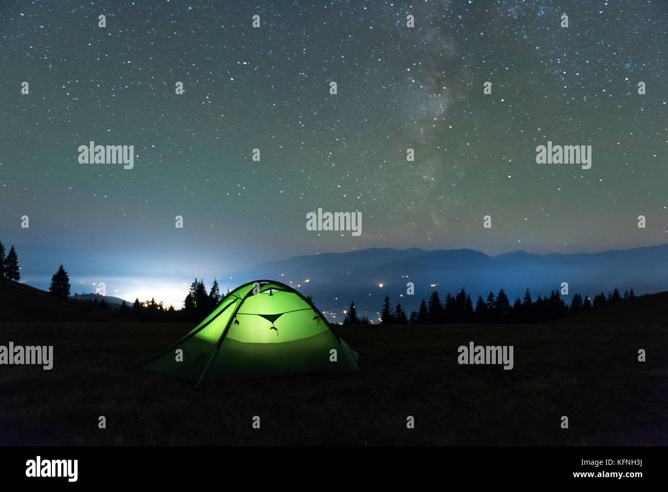 Illuminated green tent night hi-res stock photography and images - Alamy