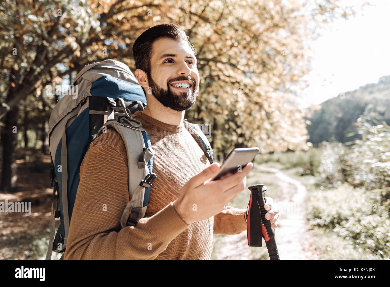 Handsome man having a walk outdoors Stock Photo - Alamy