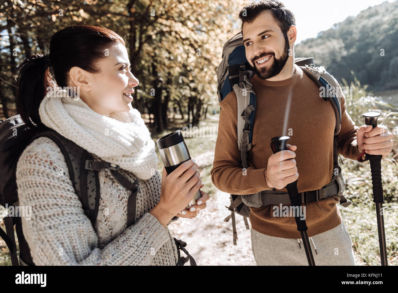 Optimistic friends looking at each other Stock Photo - Alamy