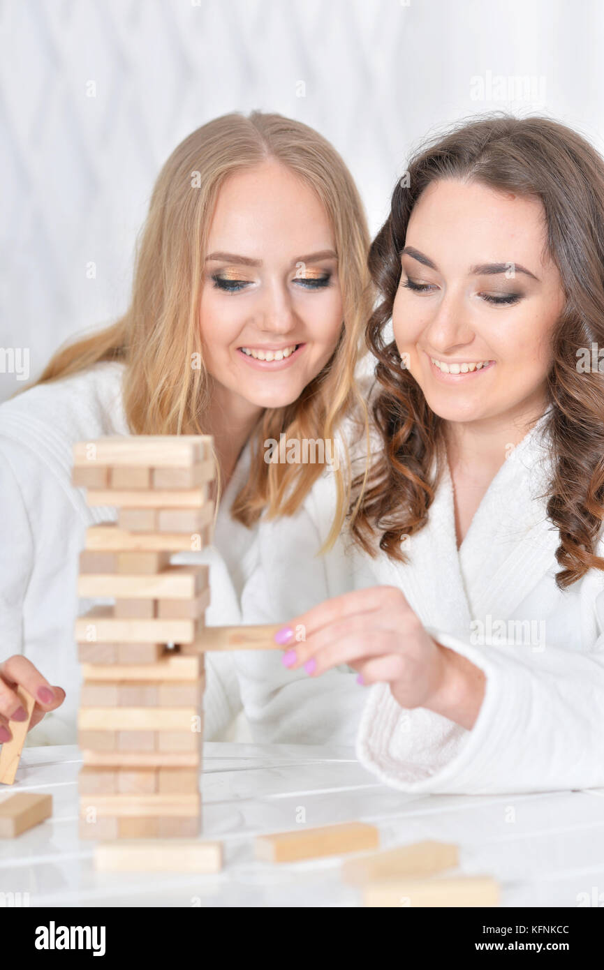 women playing with blocks Stock Photo - Alamy