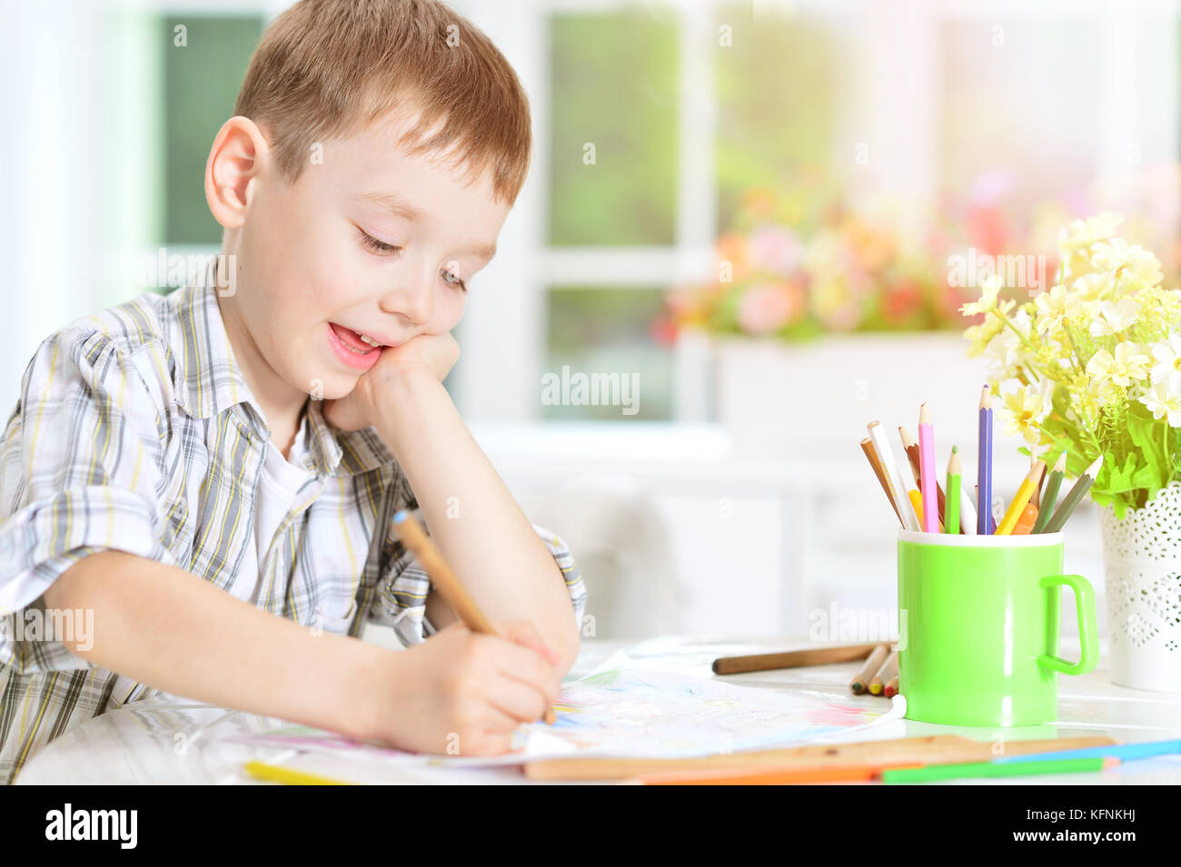 little boy drawing with pencil Stock Photo - Alamy