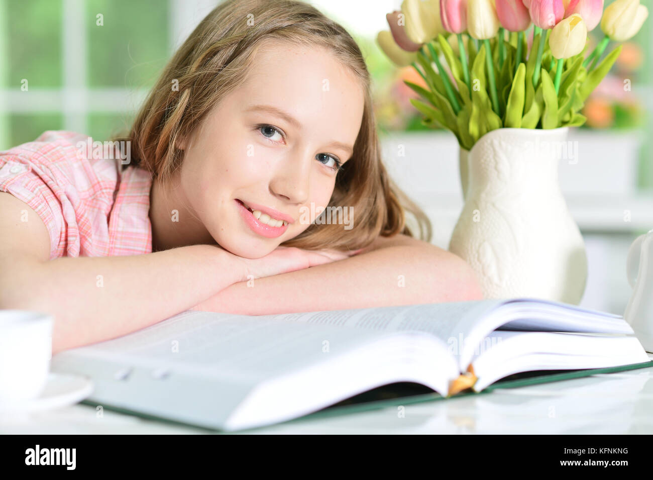 girl reading interesting book Stock Photo - Alamy