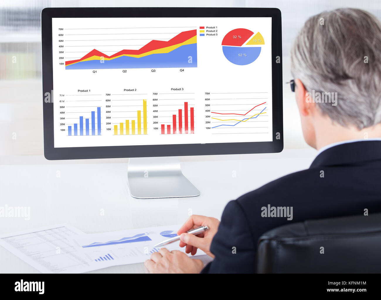 Portrait of businessman working on computer indoors Stock Photo - Alamy