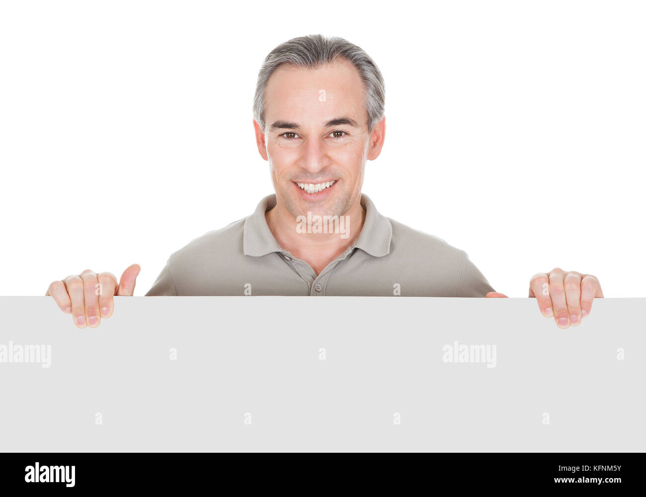 Happy Mature Man Standing Behind Placard isolated on White Background ...