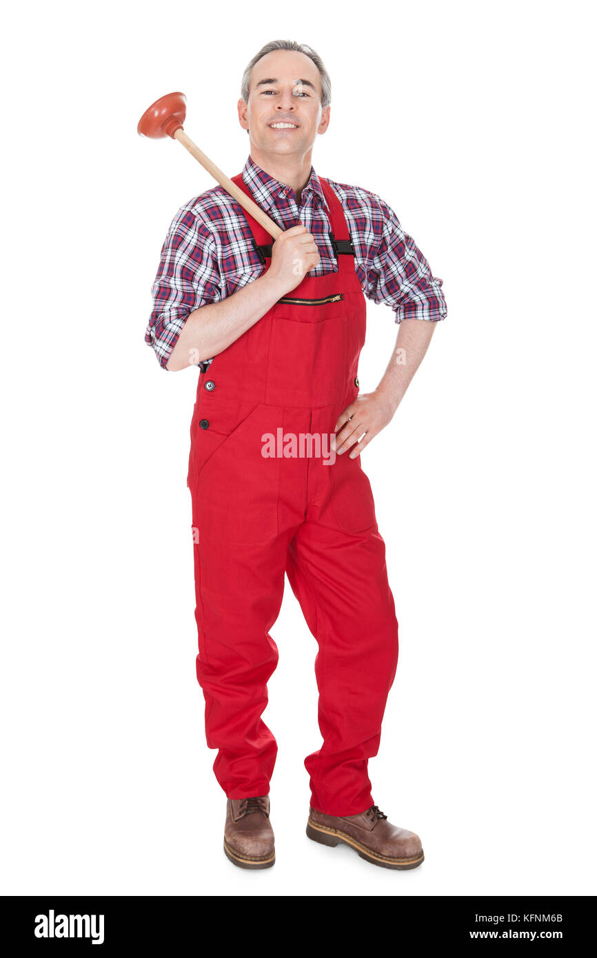 Portrait Of Male Plumber Holding Plunger over white background Stock ...