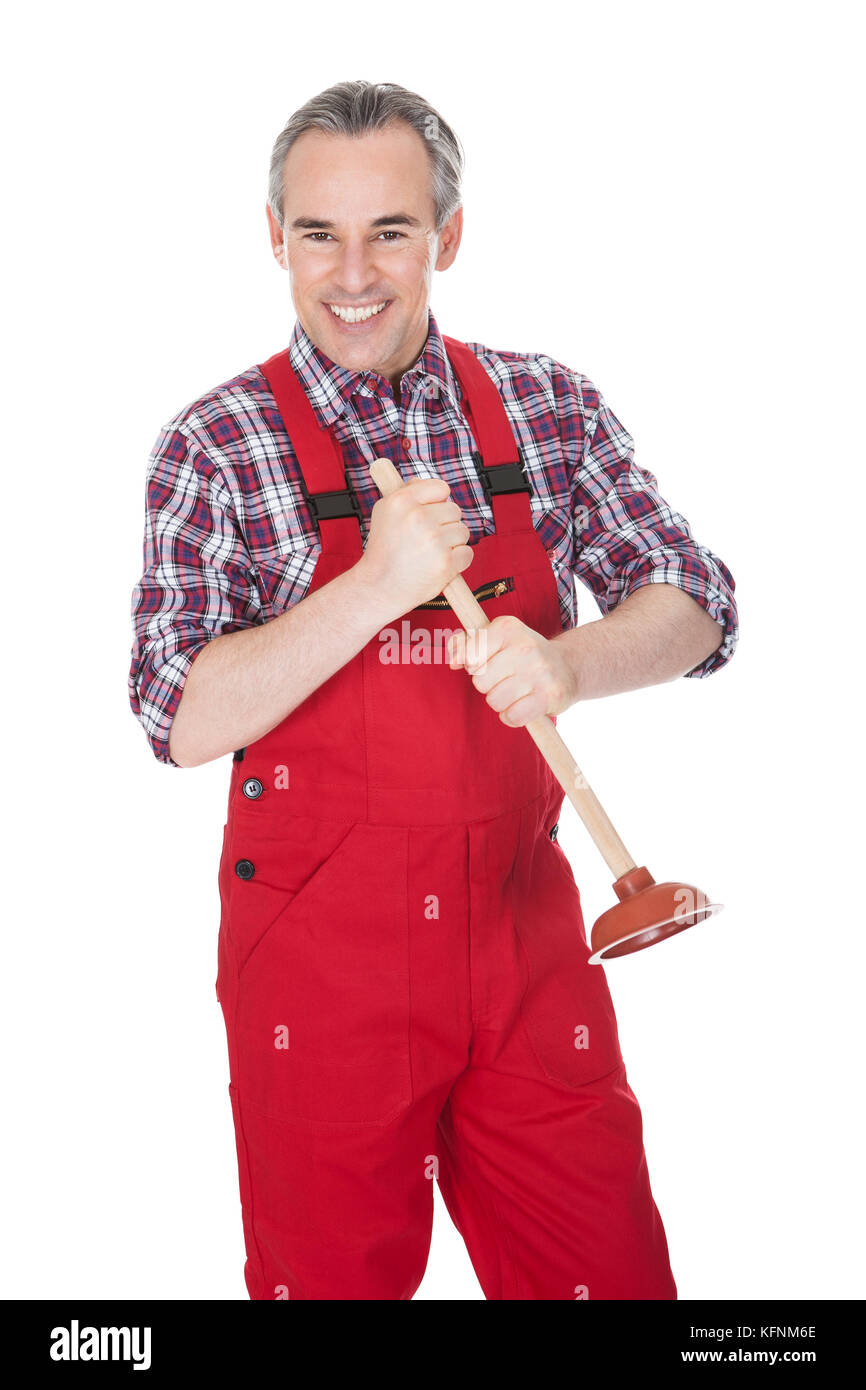 Portrait Of Male Plumber Holding Plunger over white background Stock ...
