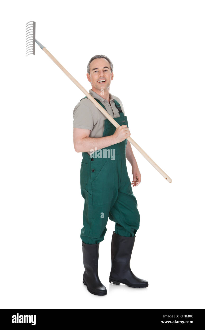 Happy male Gardner With Gardening Tool on isolated on white background ...