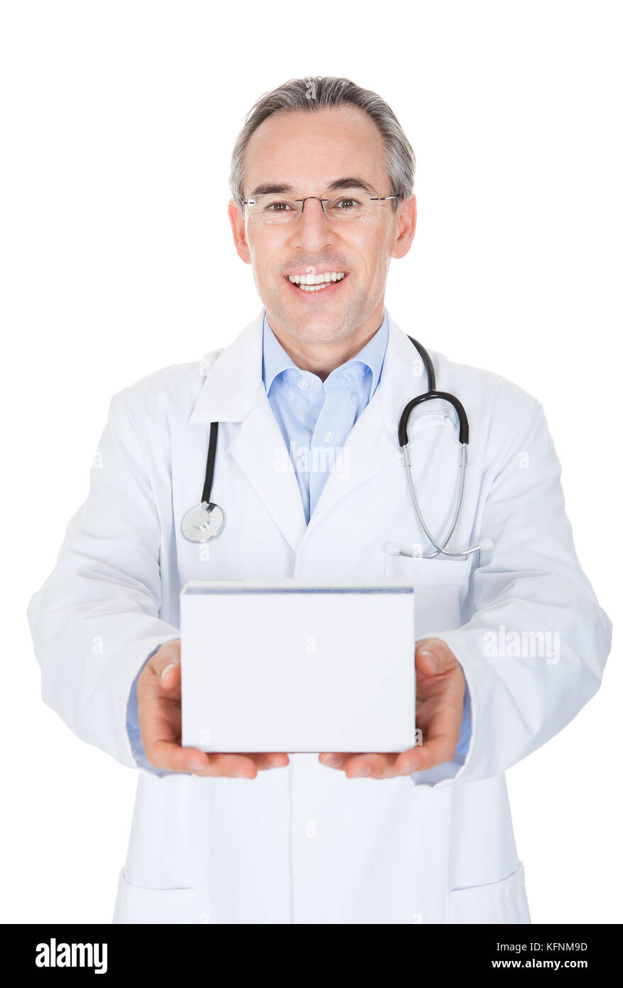 Doctor holding prescription note isolated on white background Stock ...