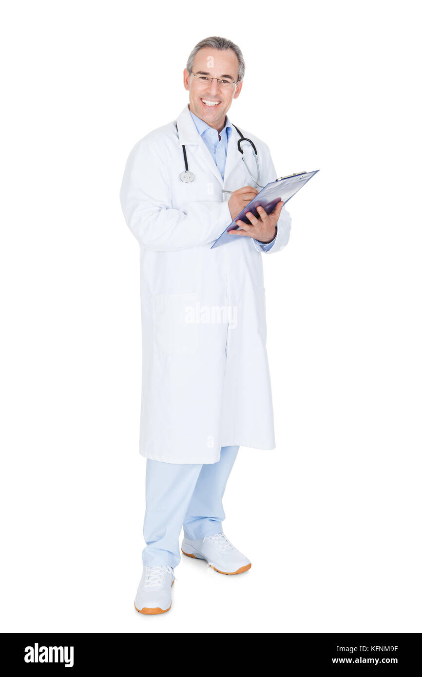 Doctor writing clinical notes hi-res stock photography and images - Alamy
