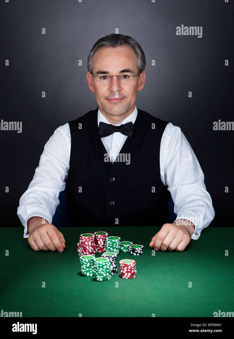 Croupier at table hi-res stock photography and images - Alamy