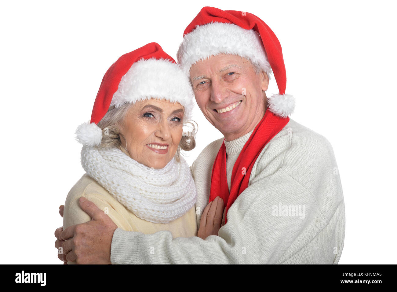 Senior couple in Santa hats Stock Photo - Alamy