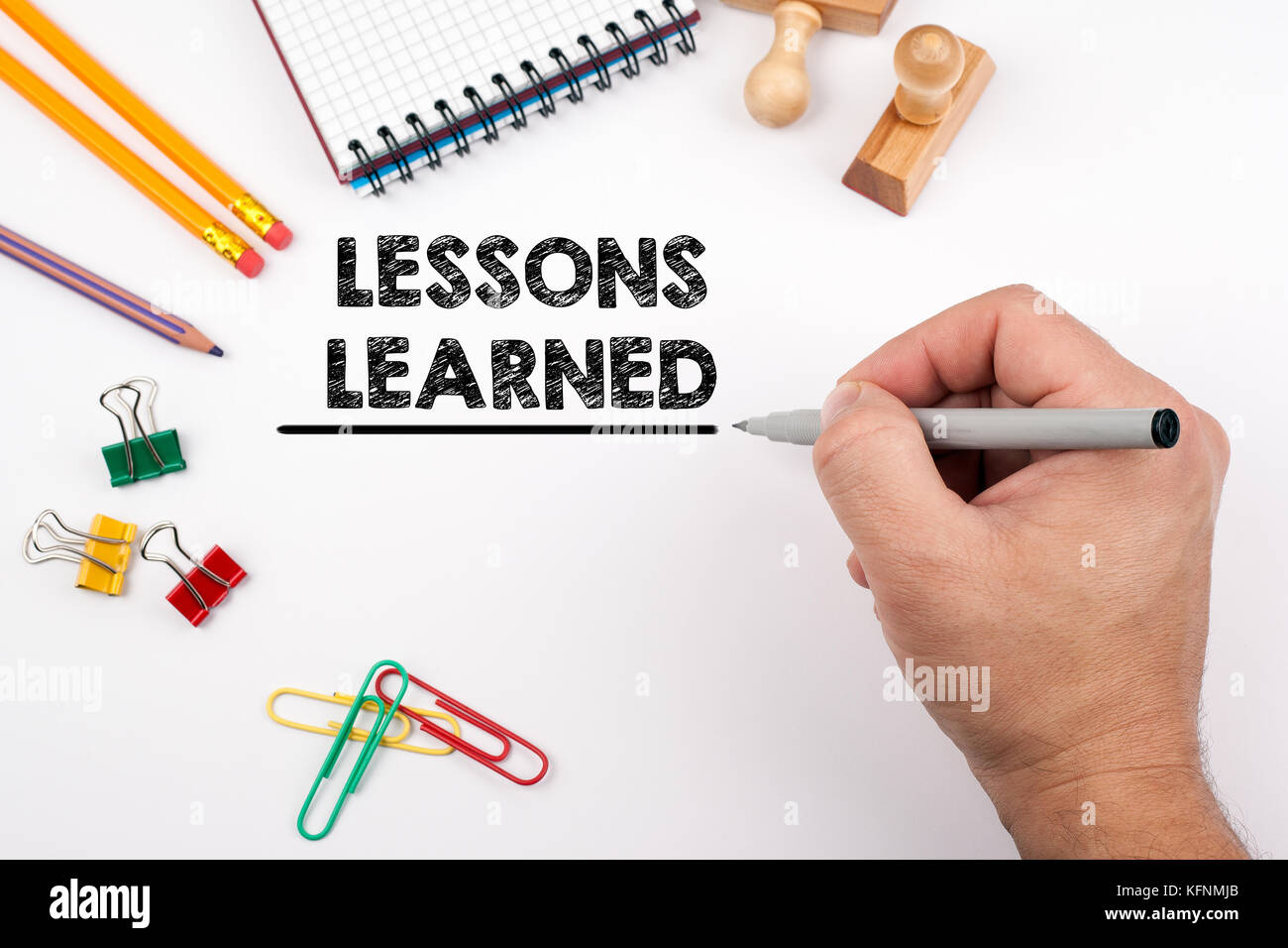 lessons learned. White office desk on which various items Stock Photo ...