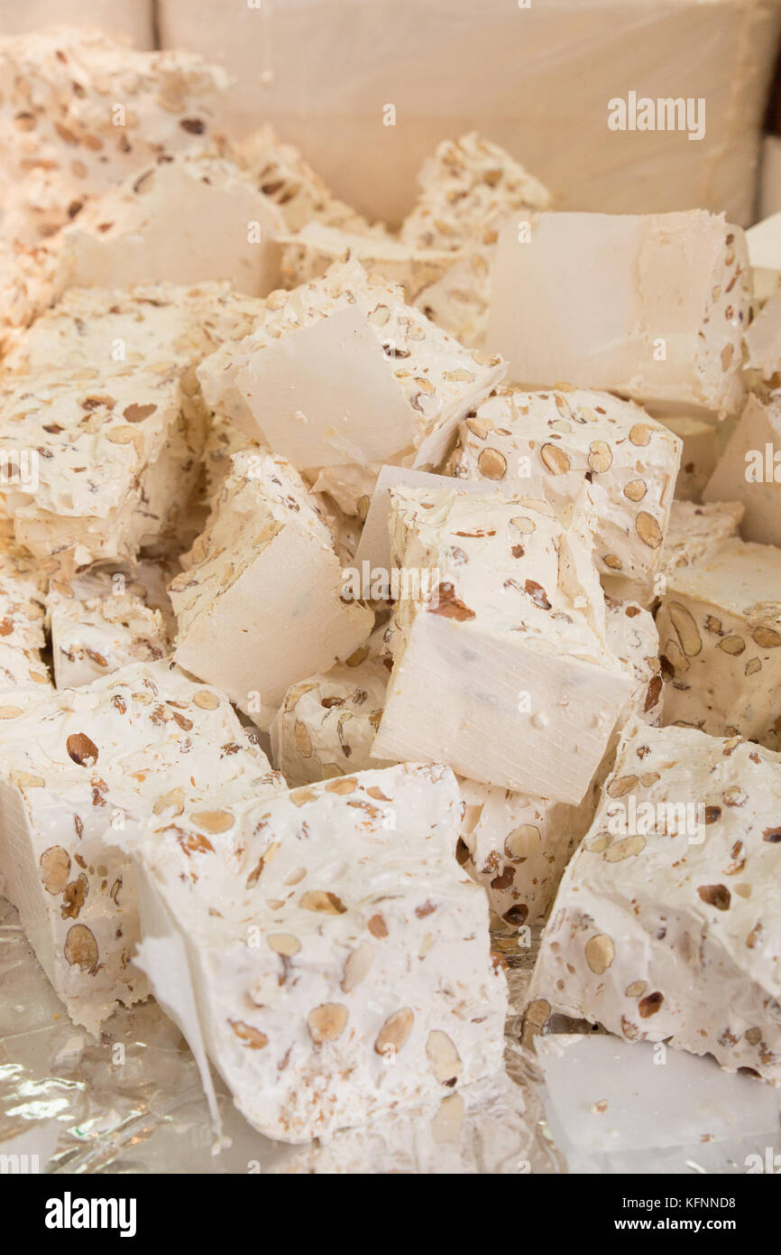 Traditional Italian almond nougat candy called torrone Stock Photo - Alamy