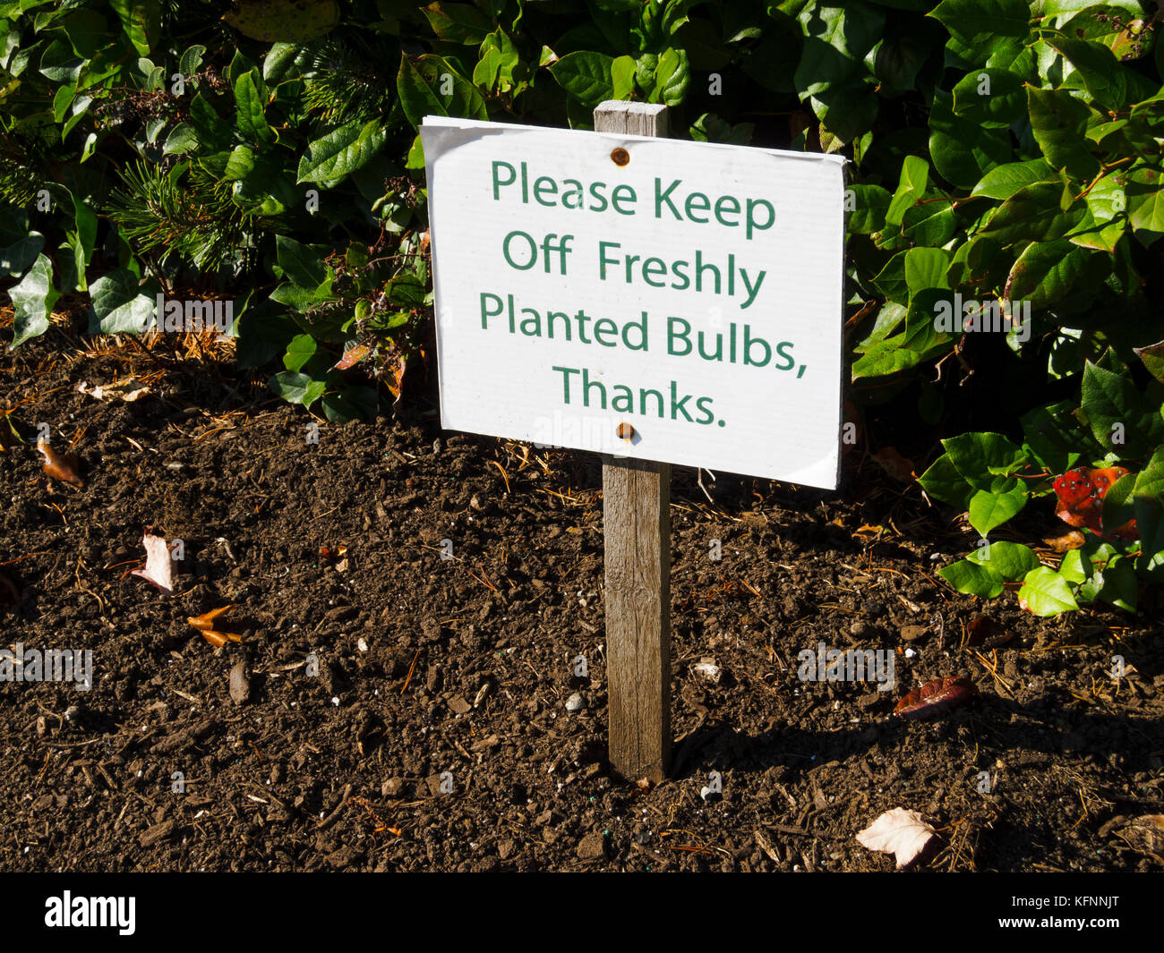 Sign "Please Keep Off Freshly Planted Bulbs, Thanks Stock Photo - Alamy