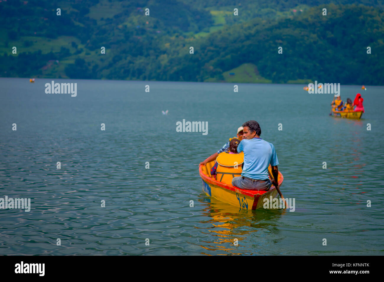 POKHARA, NEPAL - NOVEMBER 04, 2017: Family enjoying of a beautiful day ...