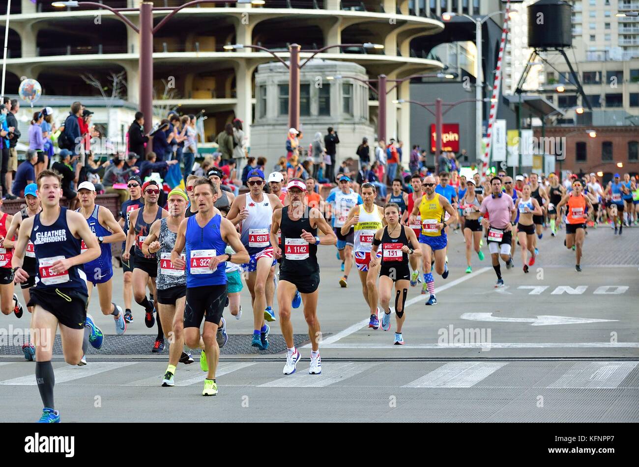 A crowd of runners as they crossed the State Street Bridge at the 40th ...