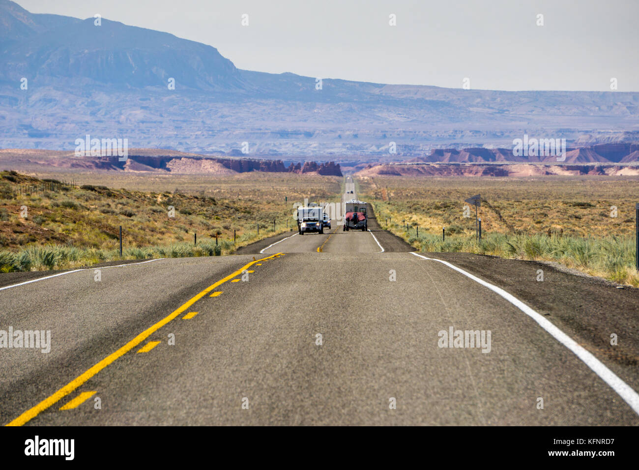 Near Goblin Valley State Park, a long straight road through the Utah ...