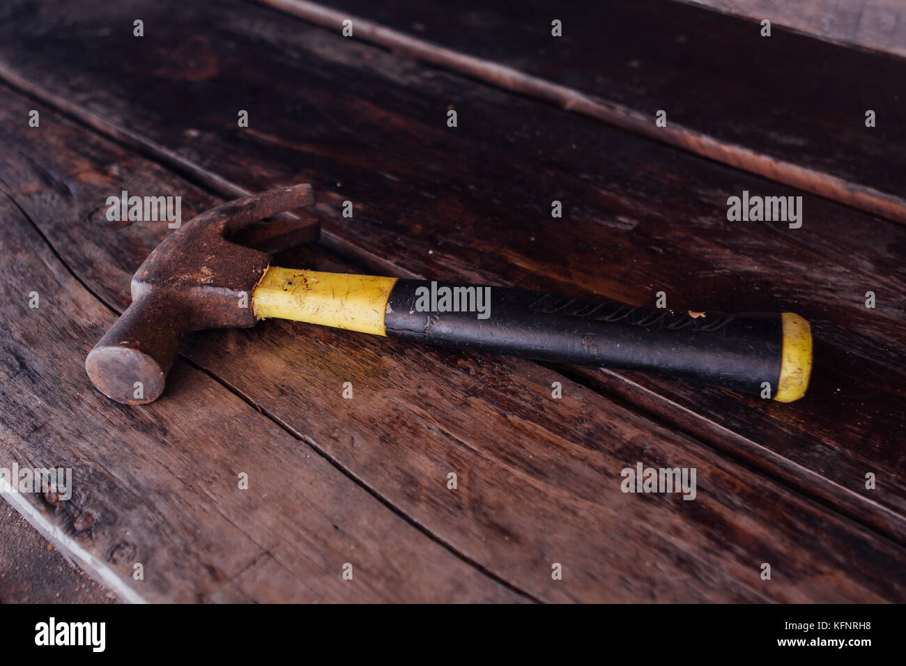 Close up old rusty hummer on wooden background Stock Photo - Alamy