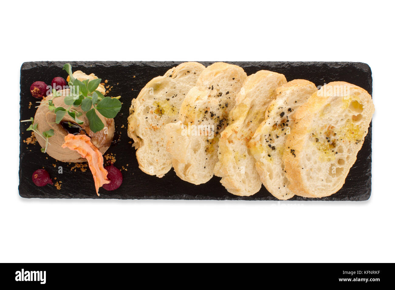 Served bread slices and pate on slate Isolated Stock Photo - Alamy