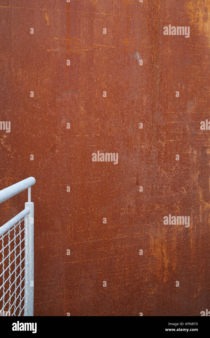 rusted metal wall unique surface and railing Stock Photo - Alamy