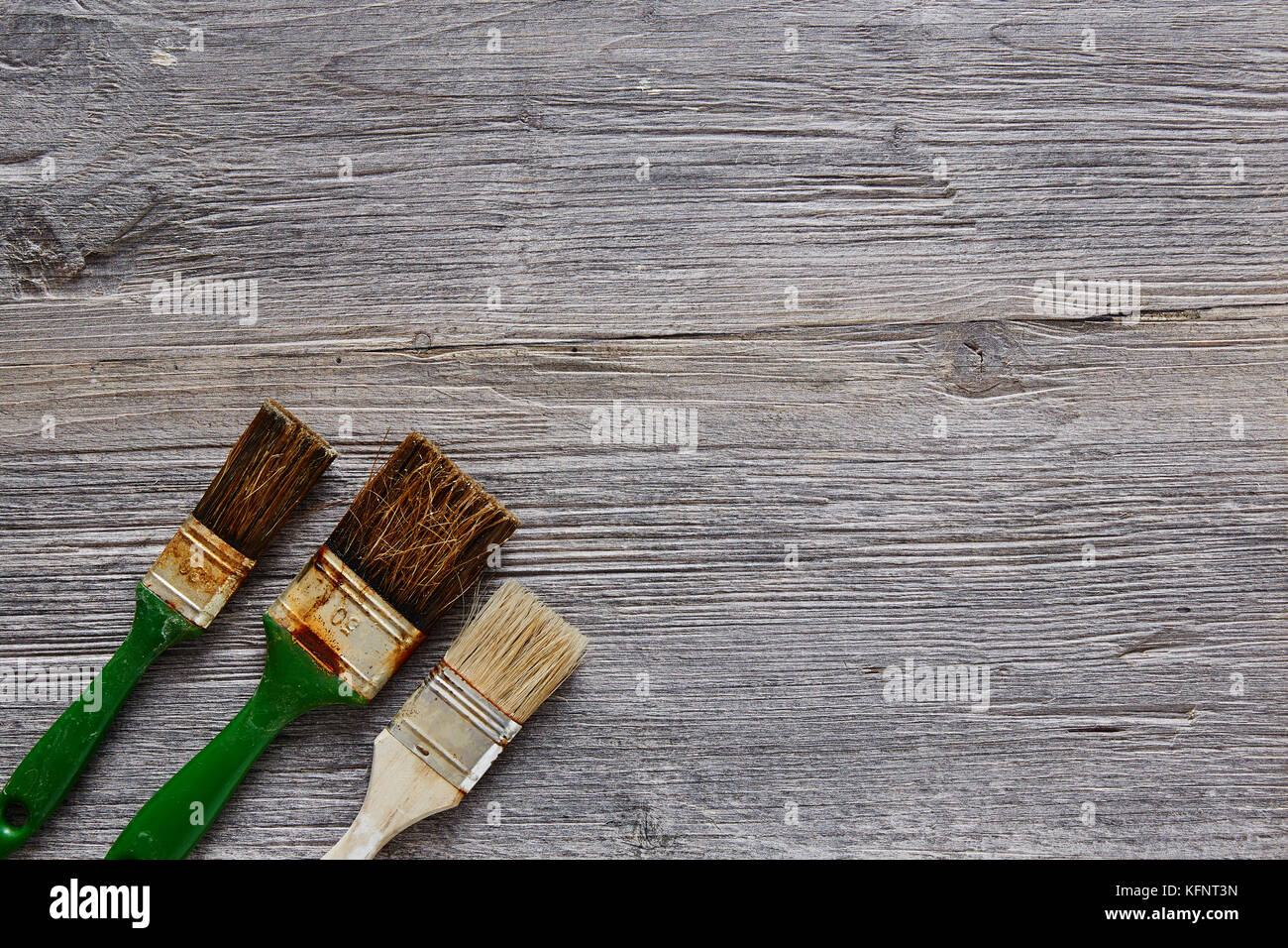 three used paintbrushes frame workshop atmosphere Stock Photo - Alamy