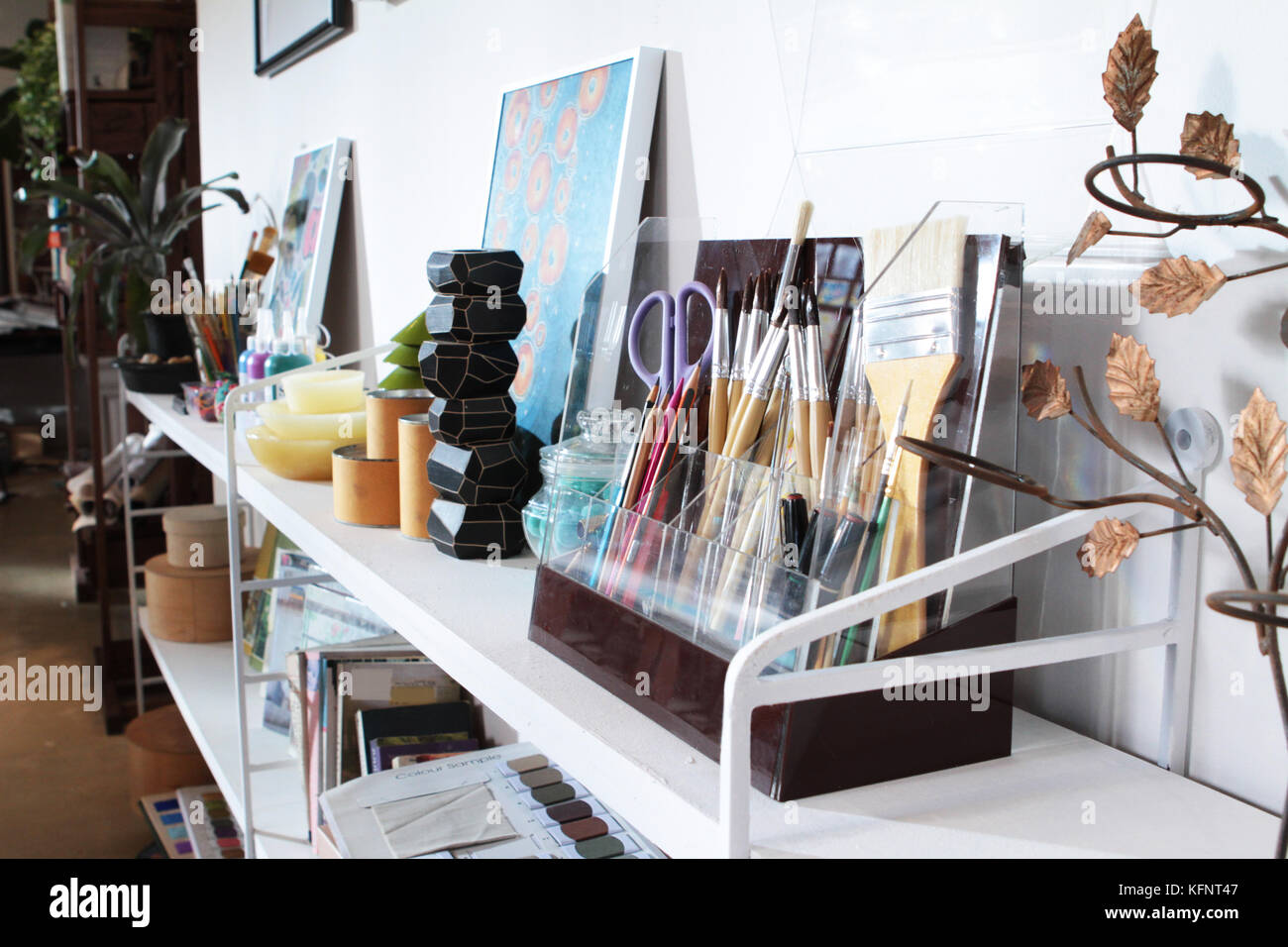 a lot of art tools put on the shelf in artist studio Stock Photo - Alamy
