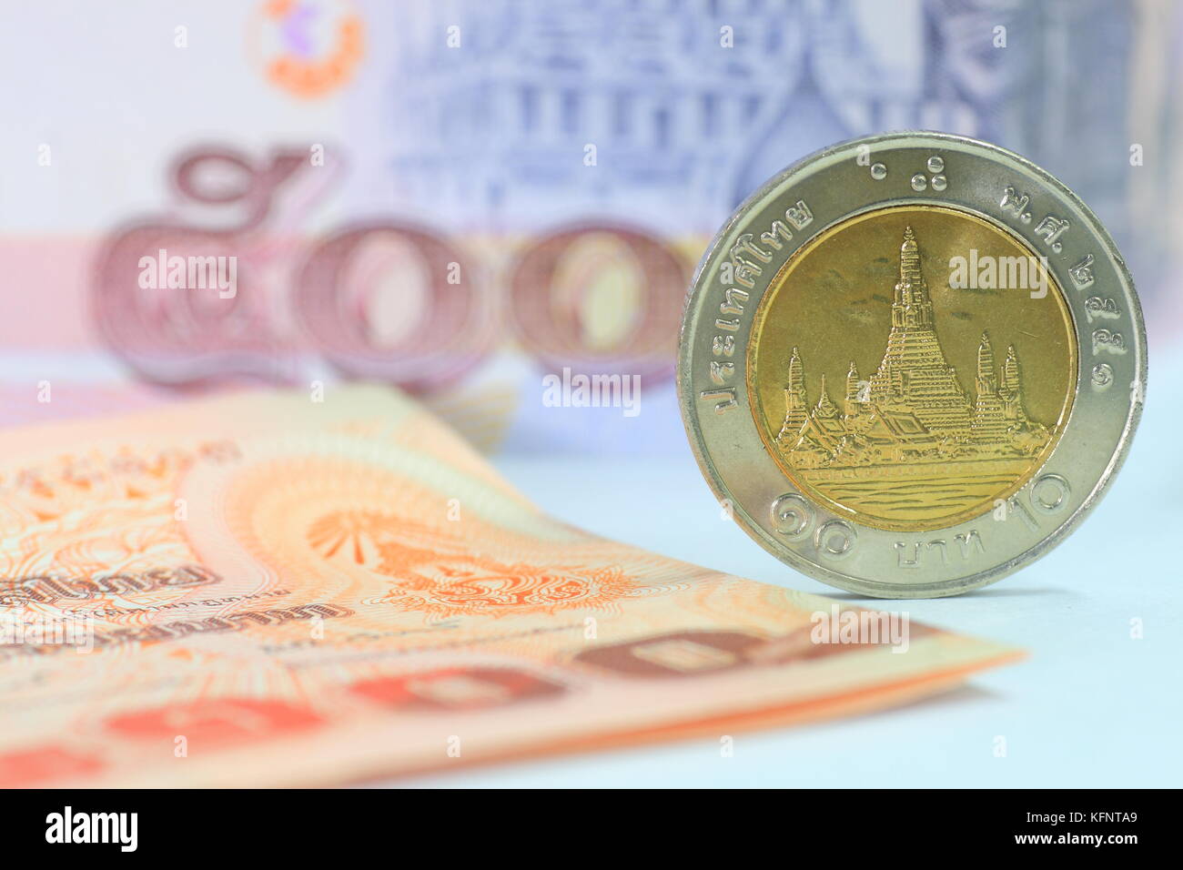 Thai money currency paper banknote and coin. For background or saving ...