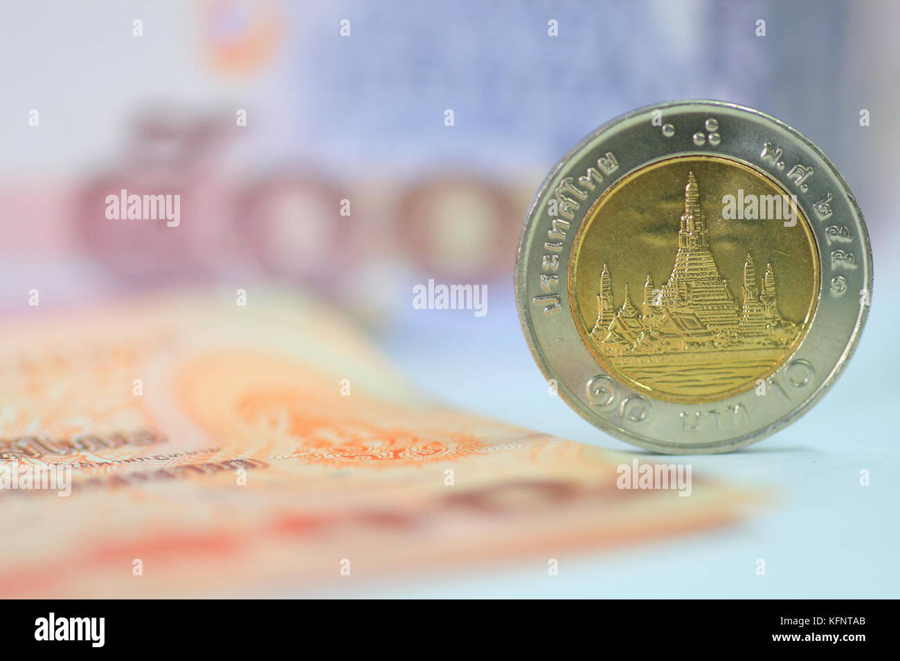 Thai money currency paper banknote and coin. For background or saving ...