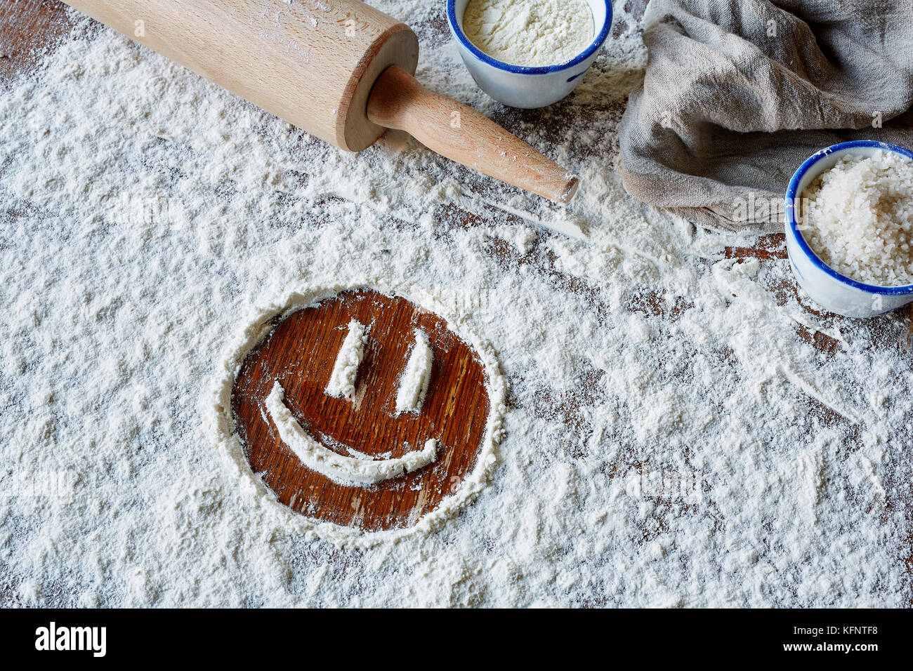 happy smiley in flour Stock Photo - Alamy