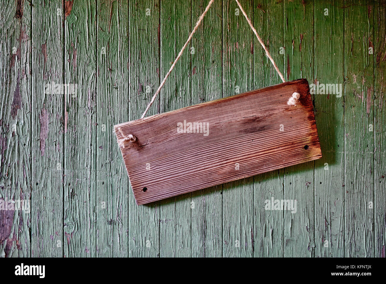 wooden sign on wathered barn wall Stock Photo - Alamy