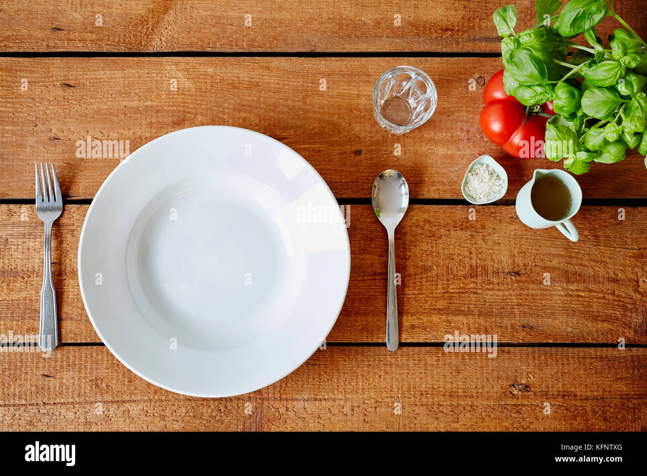 restaurant laid table plate and fresh decoration Stock Photo - Alamy
