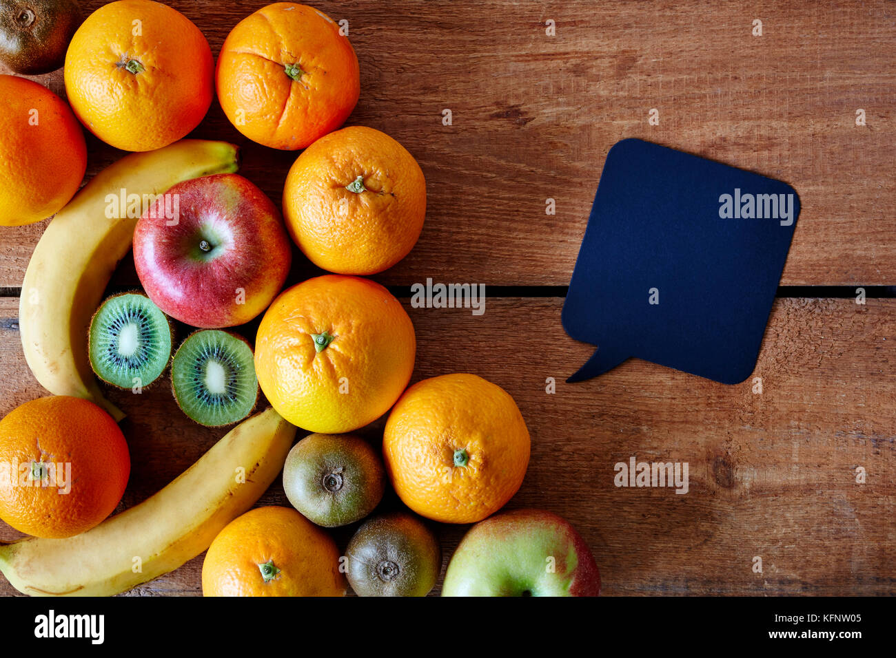 speech bubble and a bunch of fruit with a message Stock Photo - Alamy