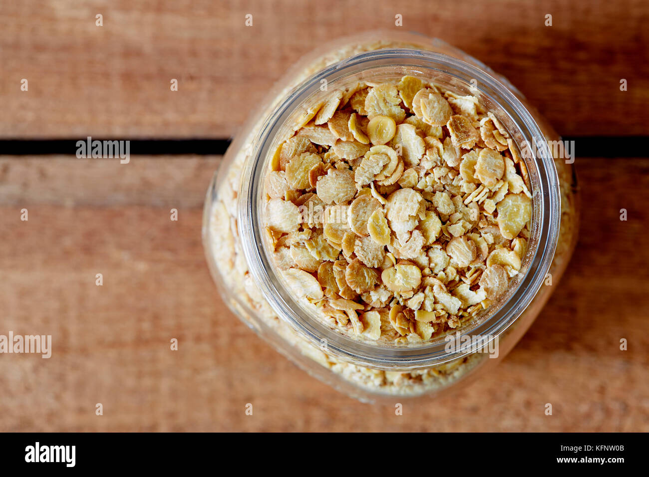 organic soy flakes in jar Stock Photo - Alamy