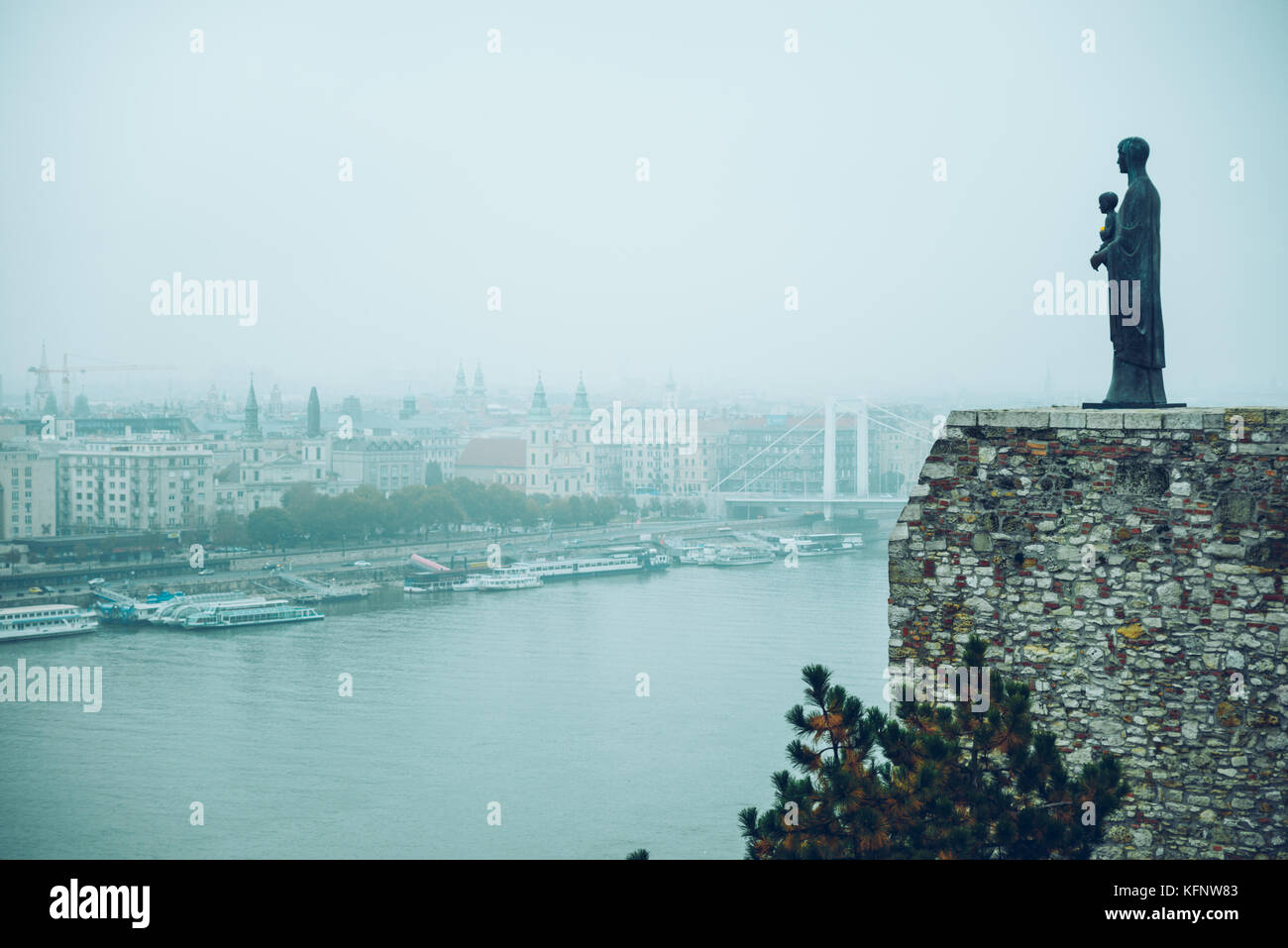 statue on the hill with beautiful view on city Stock Photo - Alamy