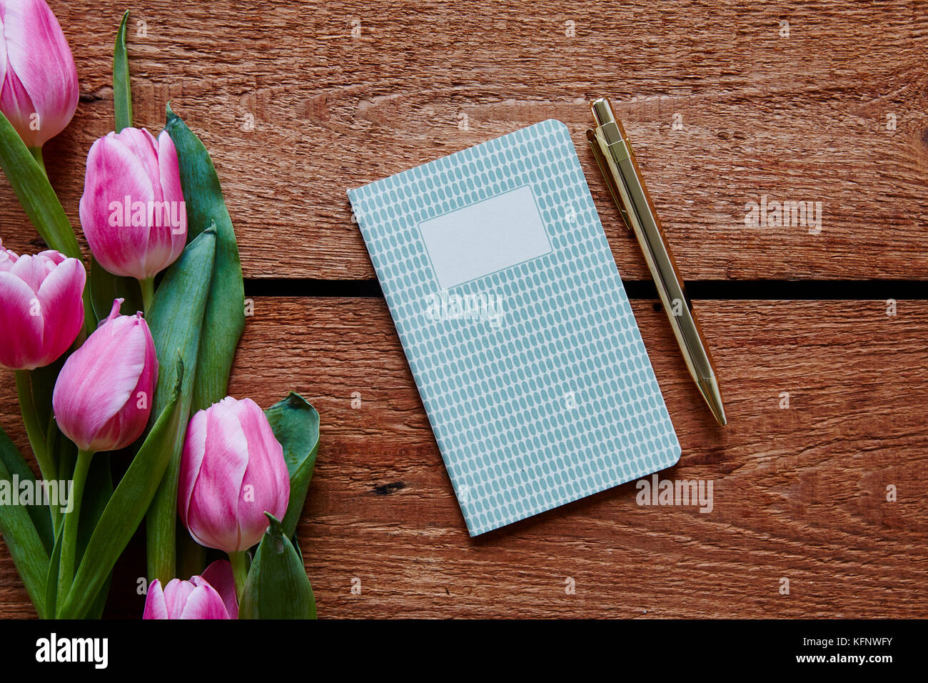 writing diary notebook and tulips spring atmosphere Stock Photo - Alamy