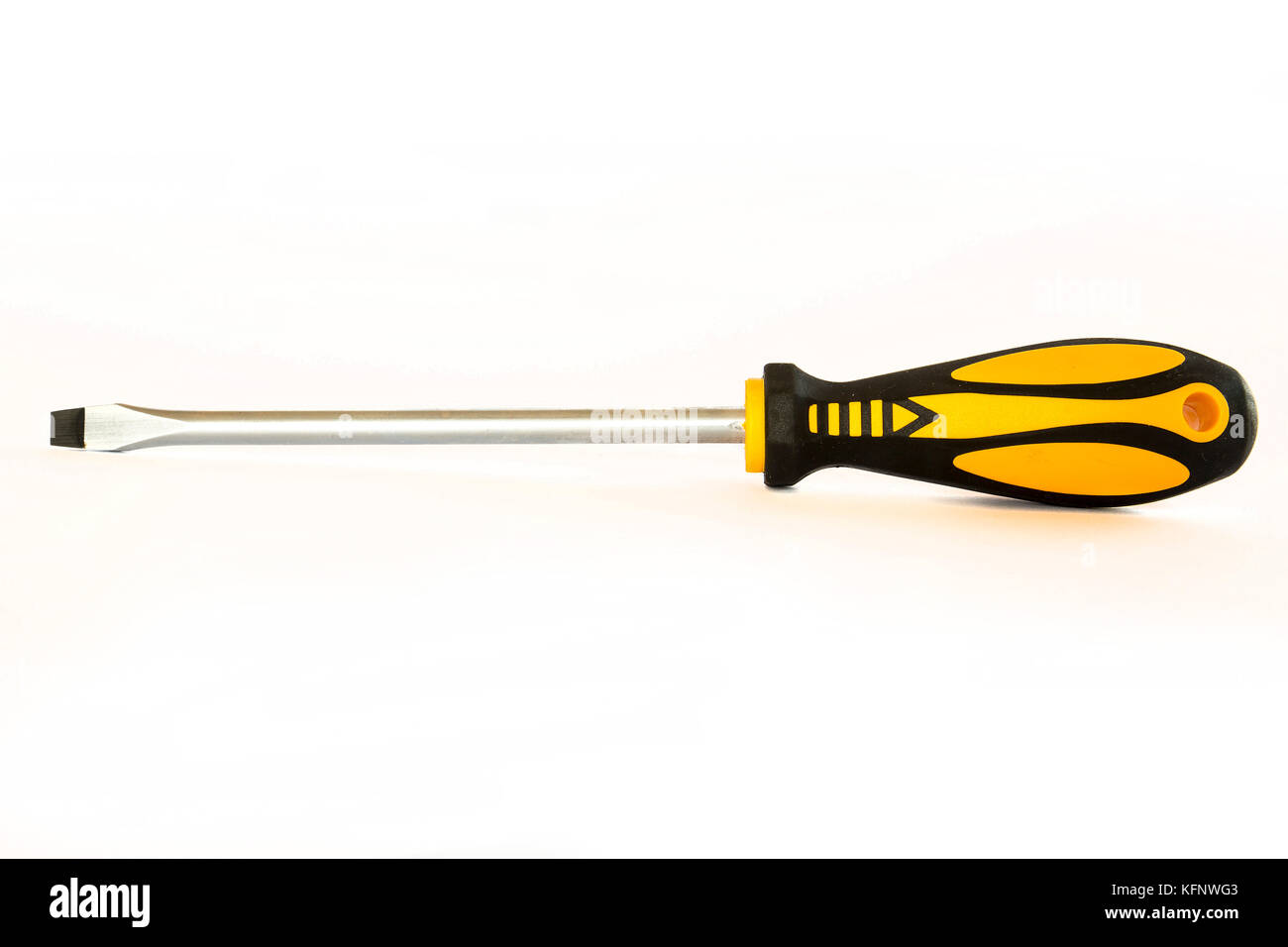 Screwdriver with rubber black and yellow handles isolated on a white ...