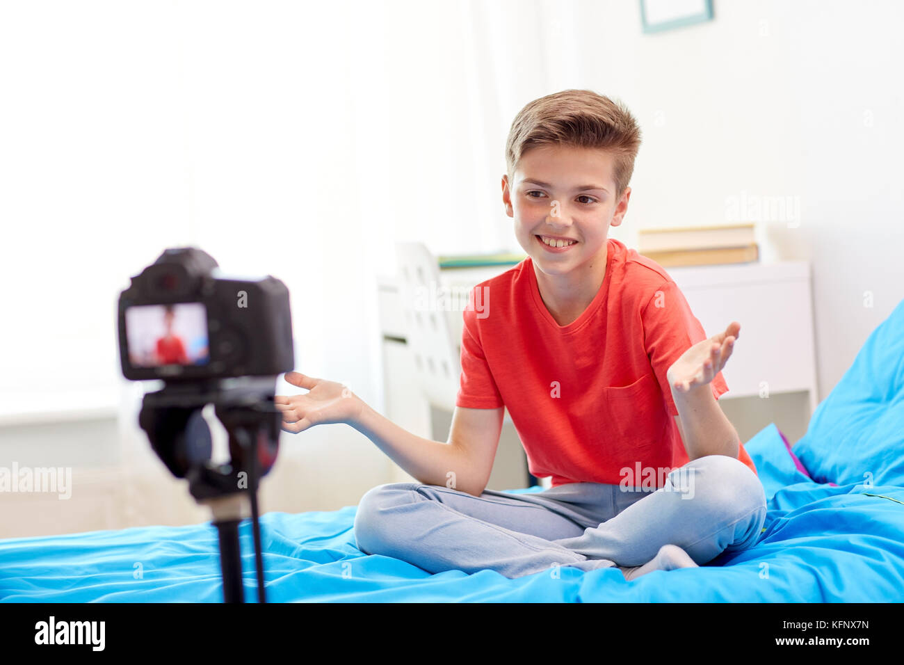 Teen boy video camera hi-res stock photography and images - Alamy