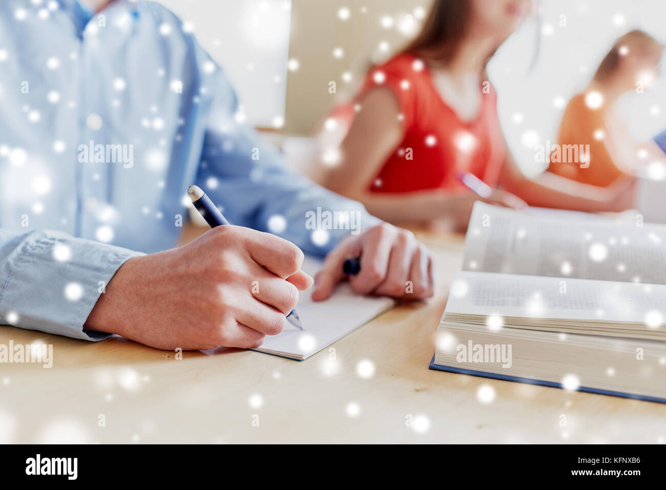 student hands with notebook writing school test Stock Photo - Alamy
